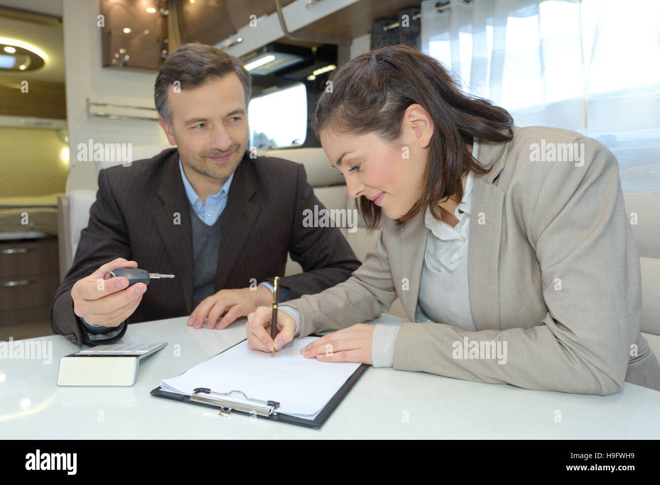 signing the contract Stock Photo - Alamy