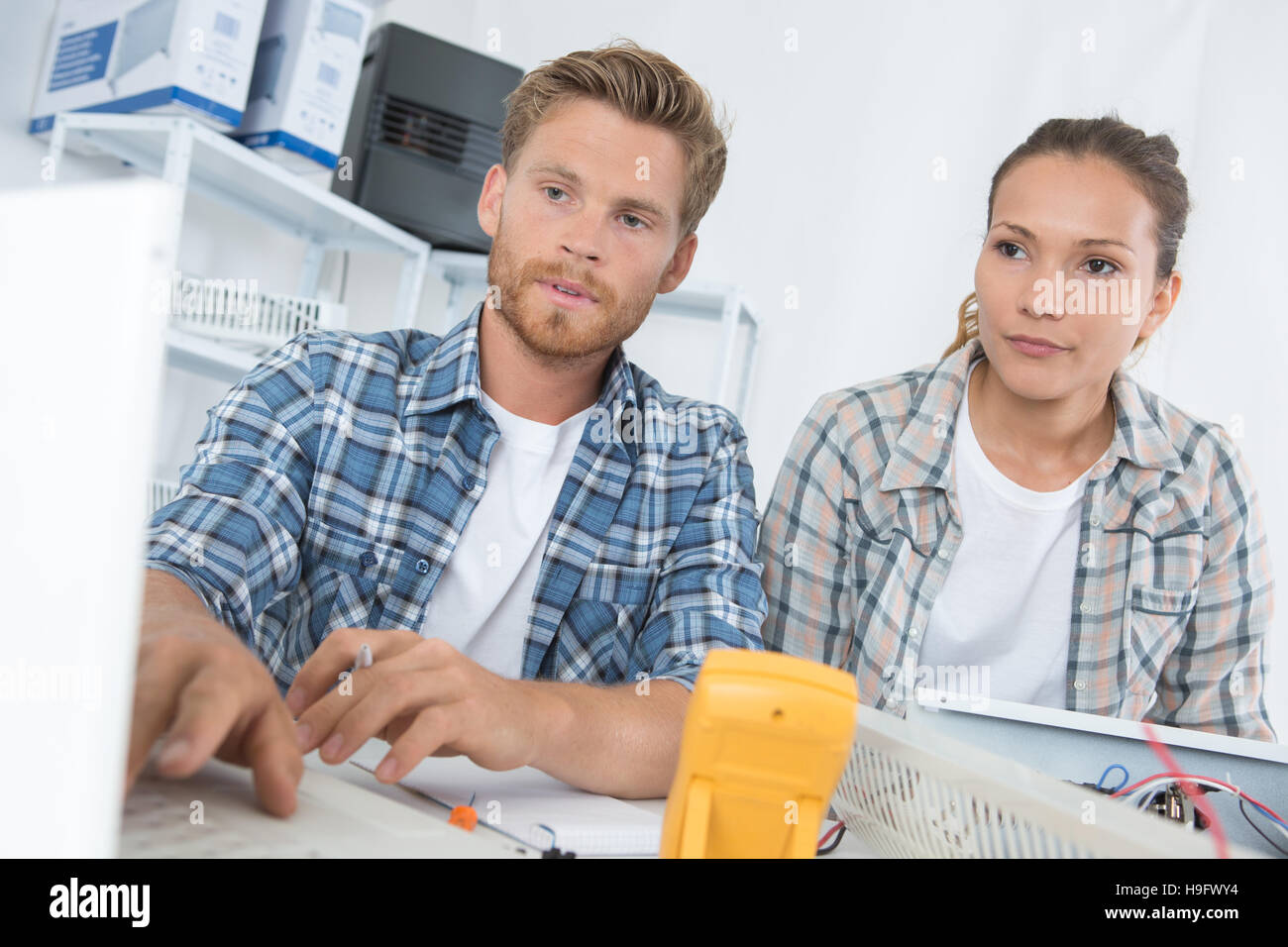 couple checking computer at home Stock Photo - Alamy