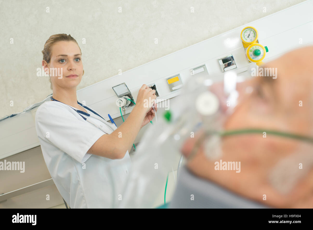 Doctor using ultrasound machine scan hi-res stock photography and ...