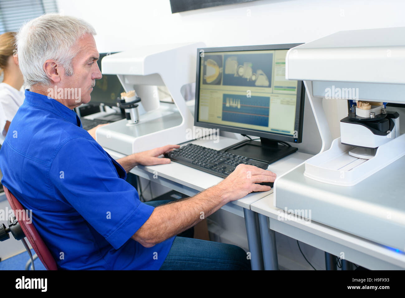 serious researcher looking at computer screen in the laboratory Stock ...