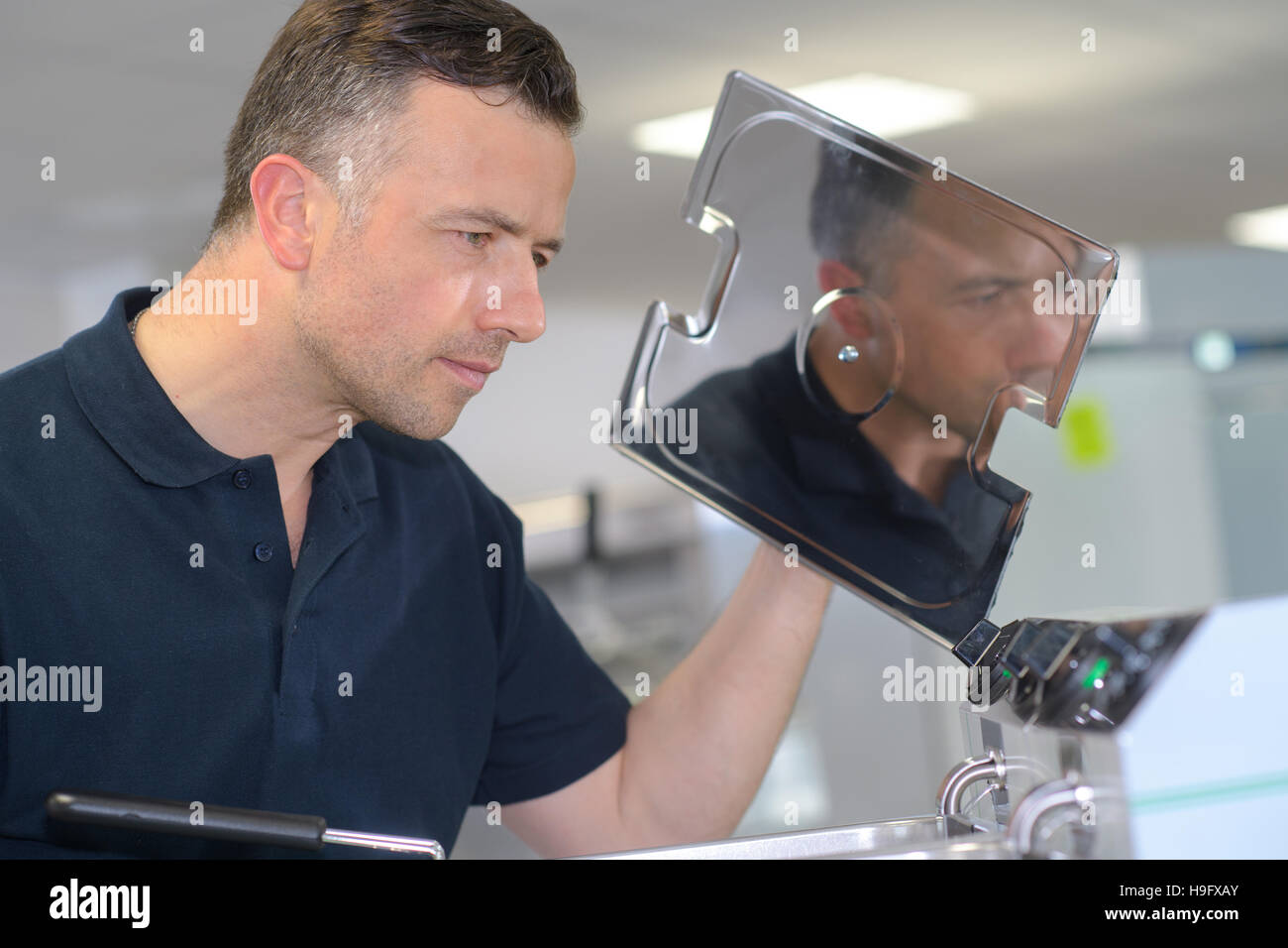engineer opening industrial process tank Stock Photo - Alamy