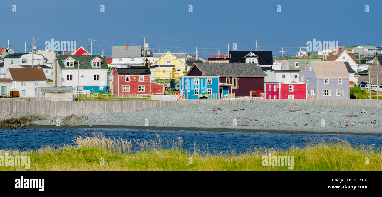 Small town with bright colored homes all over the coastal villages ...
