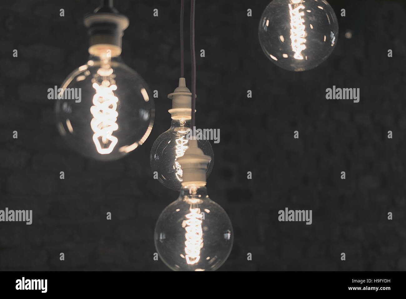 Vintage style round light bulbs hanging from the ceiling Stock Photo ...