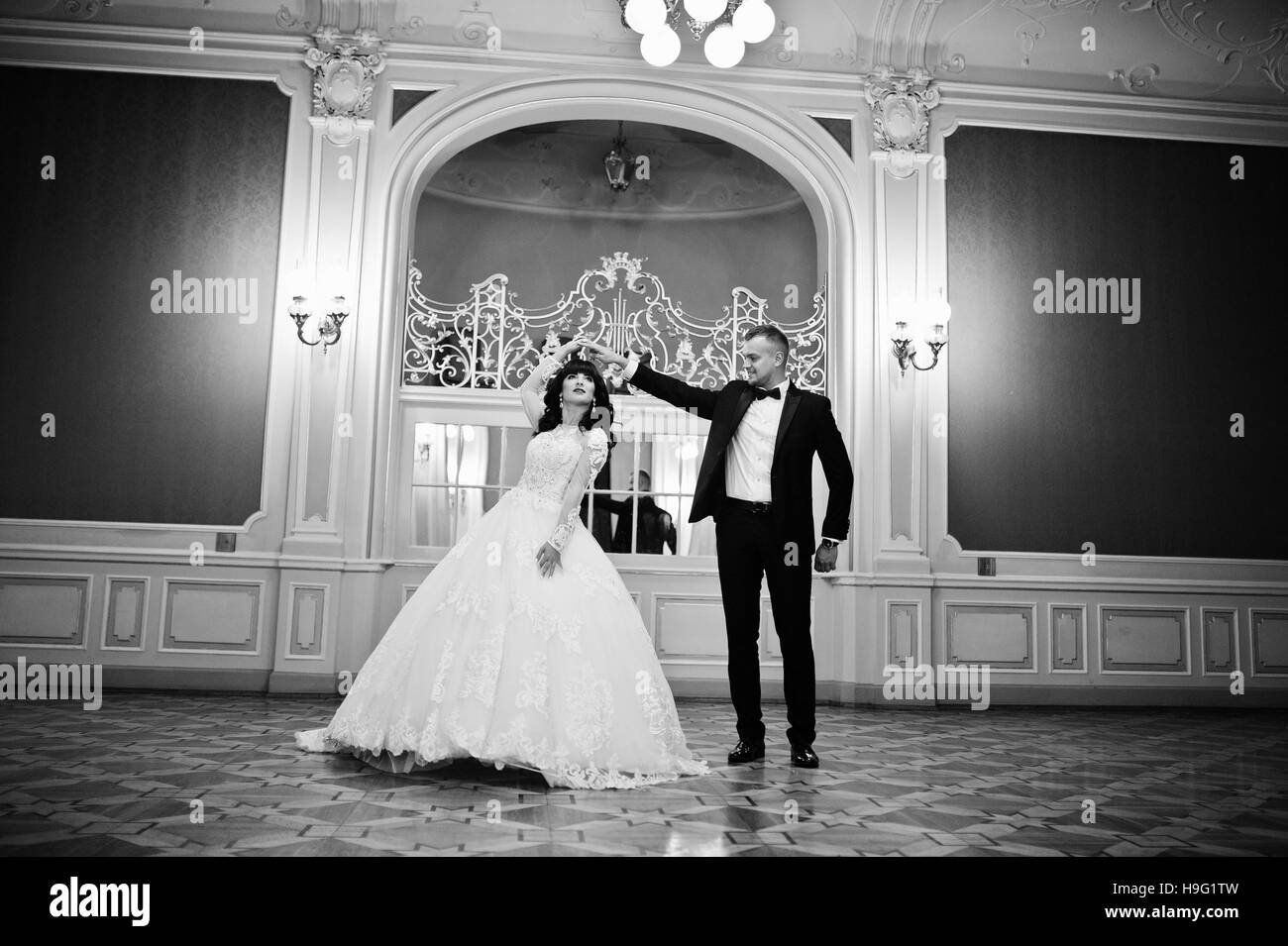 Magnificent wedding couple on royal room with many mirrors Stock Photo ...