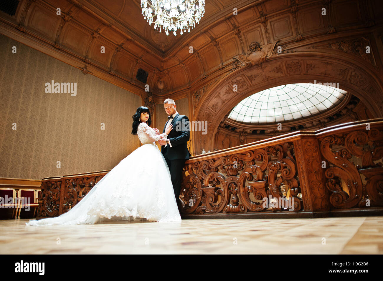 Magnificent wedding pair newlywed at rich wooden royal palace Stock ...
