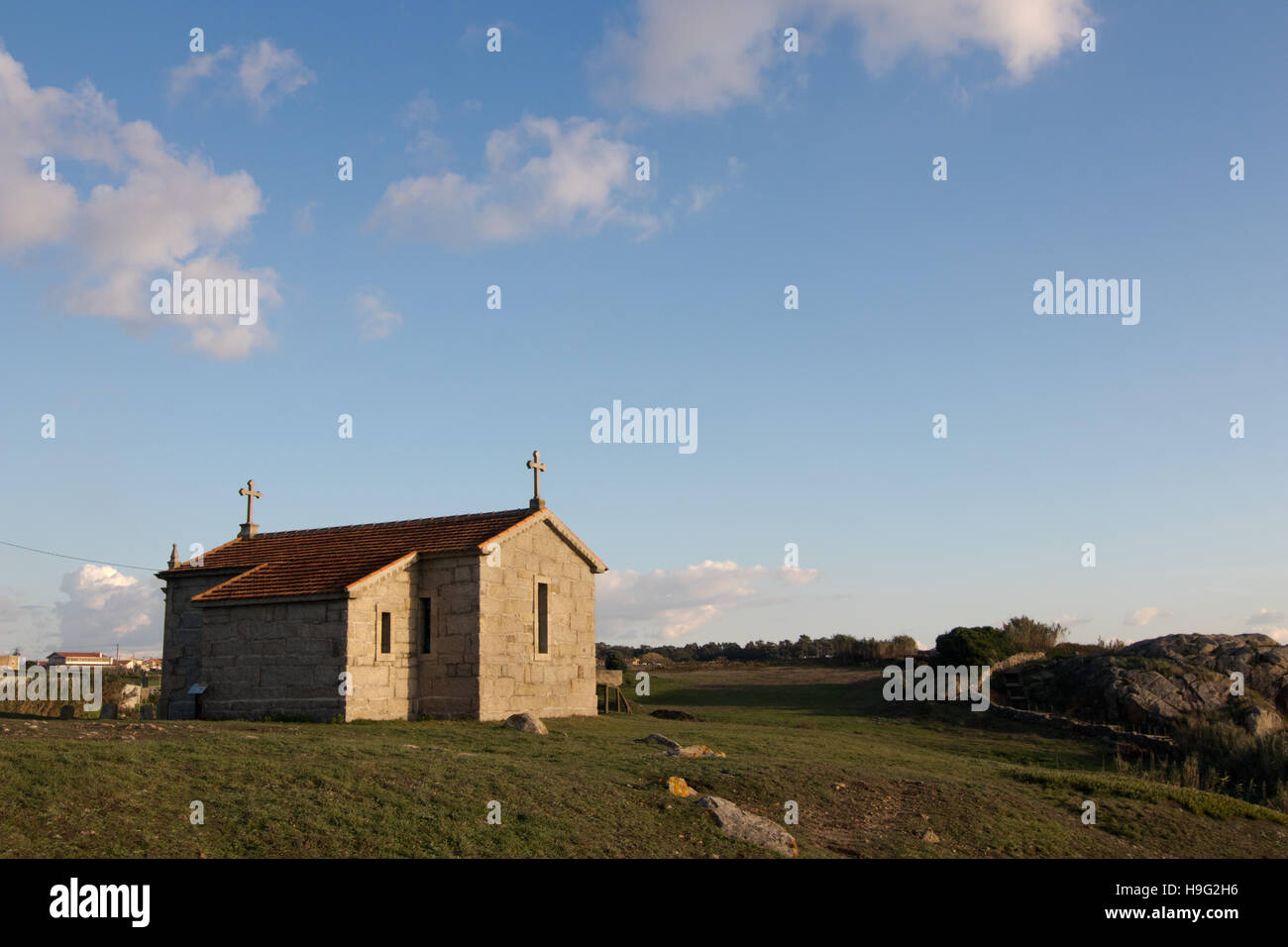 Ancient church and stone cross Stock Photo - Alamy