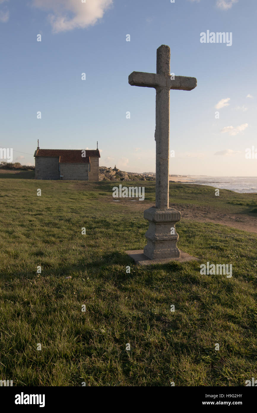 Ancient church and stone cross Stock Photo - Alamy