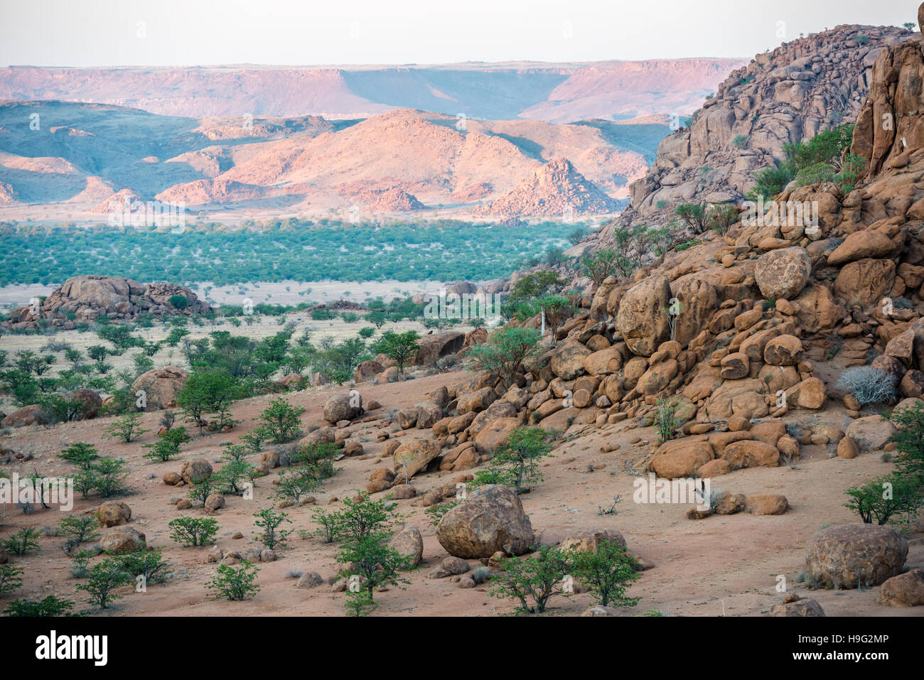 Rocky landscape of Kunene Region at Namibian winter with huge boulders ...