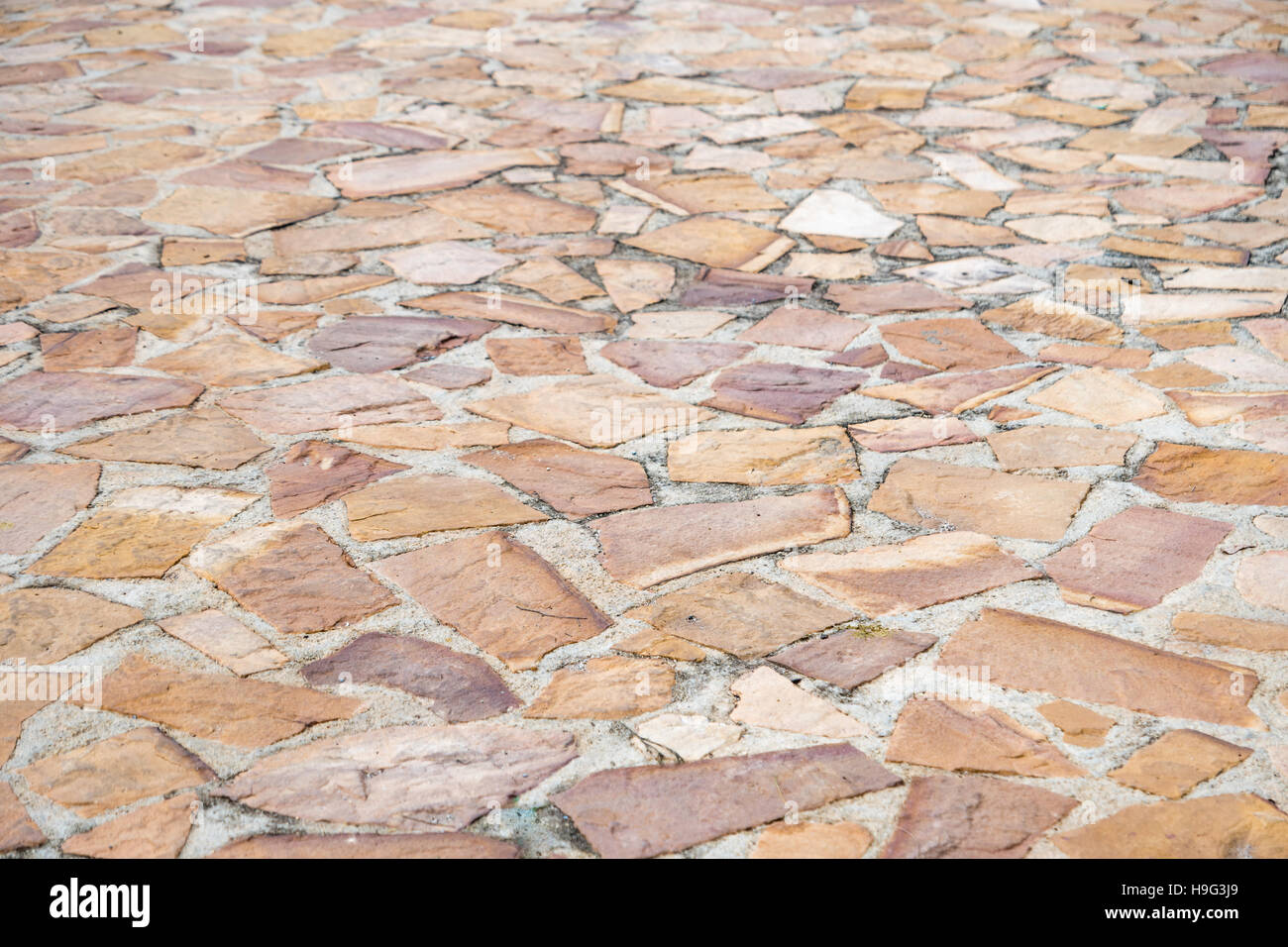 Granite gray flagstone pavement wall background Stock Photo - Alamy