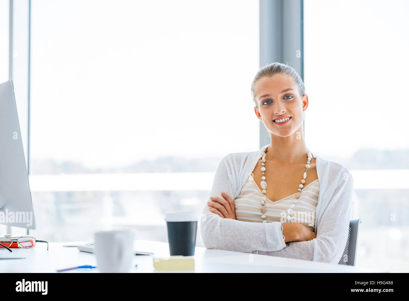 Elegant office worker Stock Photo - Alamy