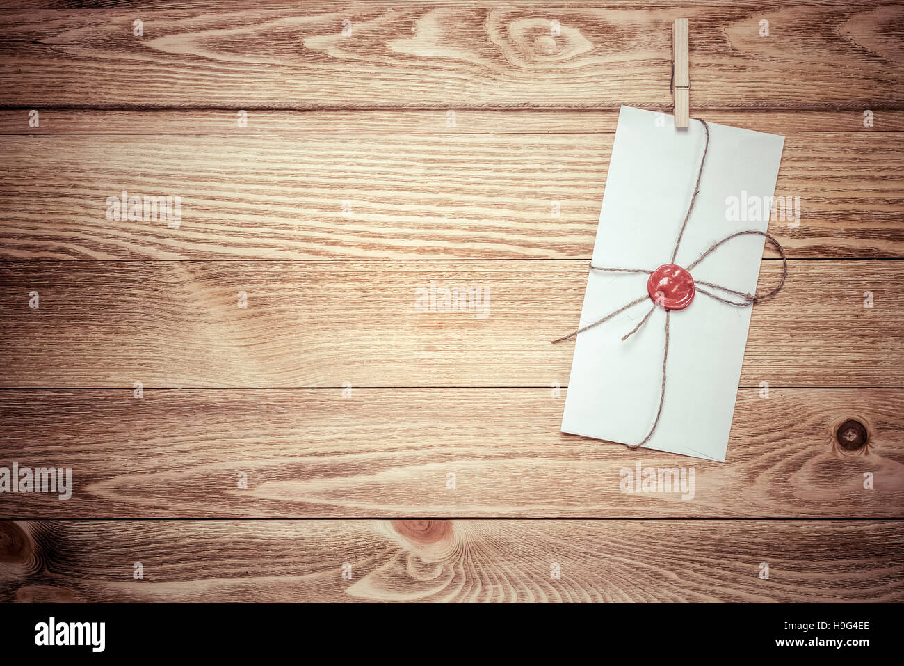 Mail envelope on rope Stock Photo - Alamy