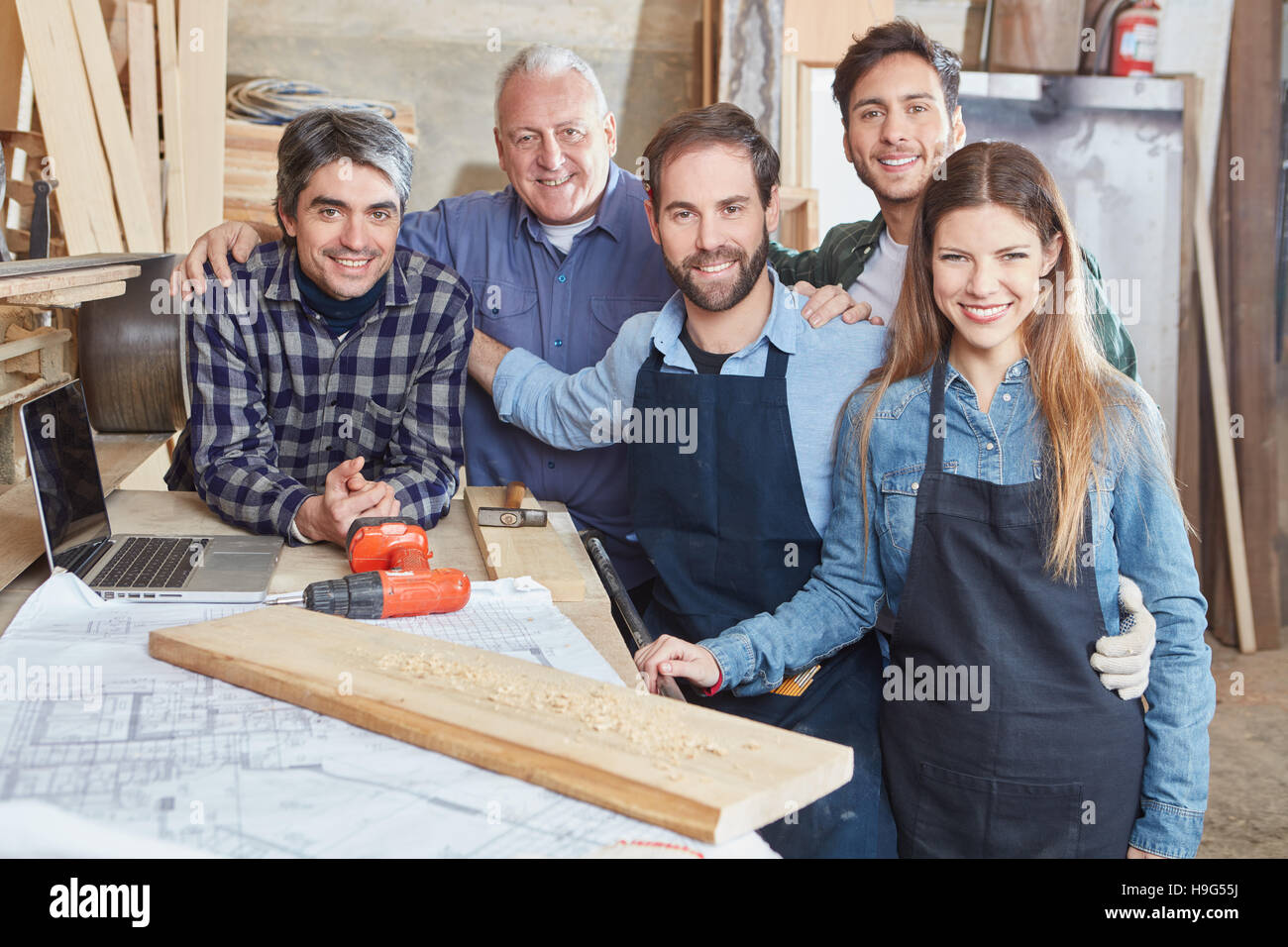 Team of men hi-res stock photography and images - Alamy