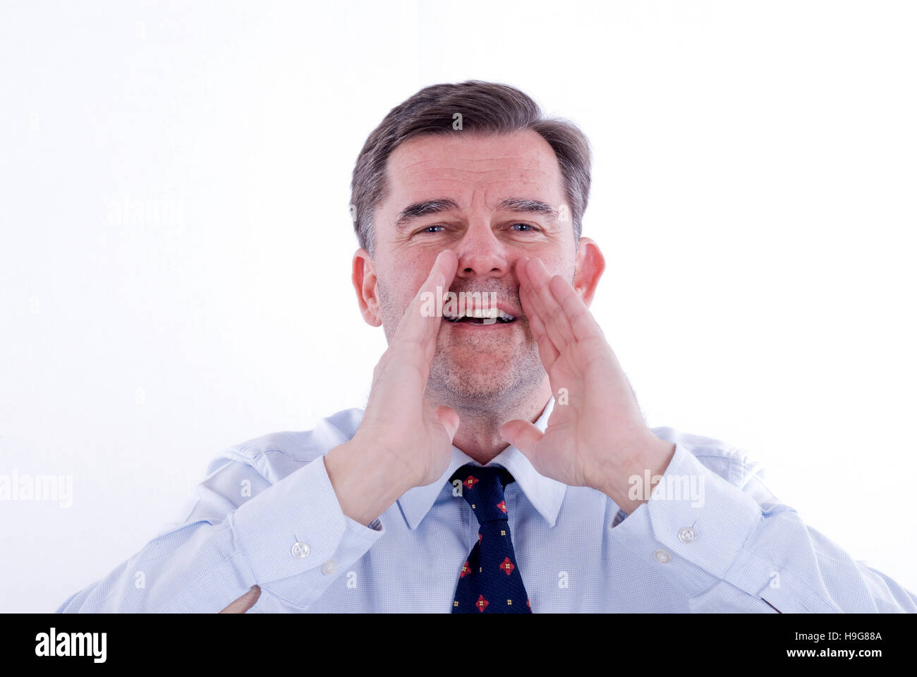 Businessman shouting something, 50+ Stock Photo - Alamy
