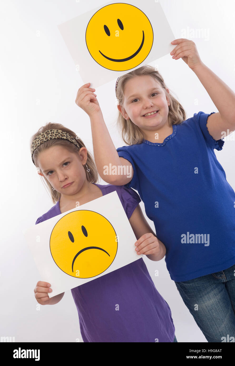 Sad and happy child, symbolic picture Stock Photo - Alamy