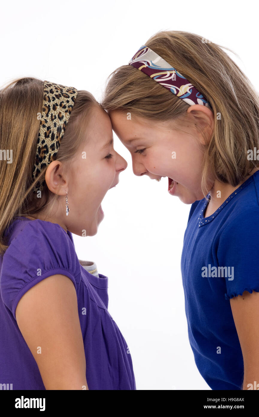 Girls shouting at each other Stock Photo - Alamy