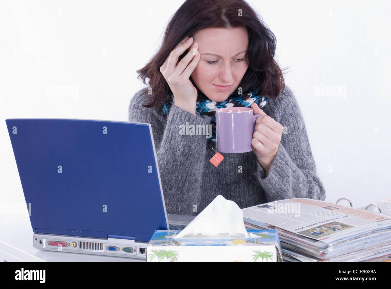 Sick woman at work Stock Photo - Alamy