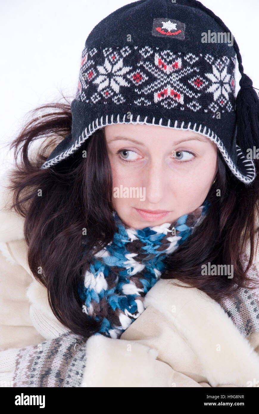 Freezing woman wearing winter clothes Stock Photo - Alamy