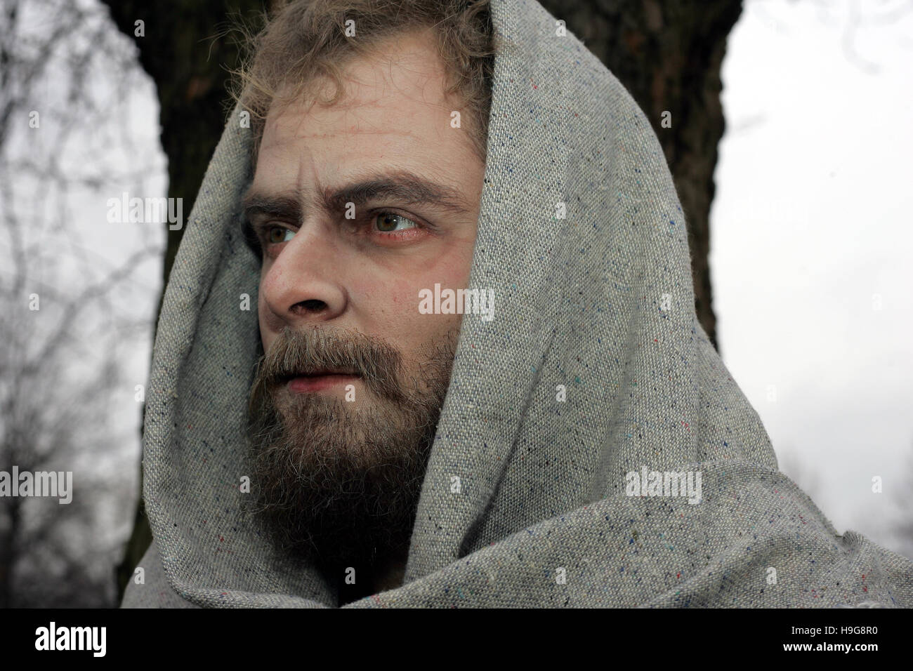 Man with a beard wearing theatrical make-up for the opera Stock Photo ...