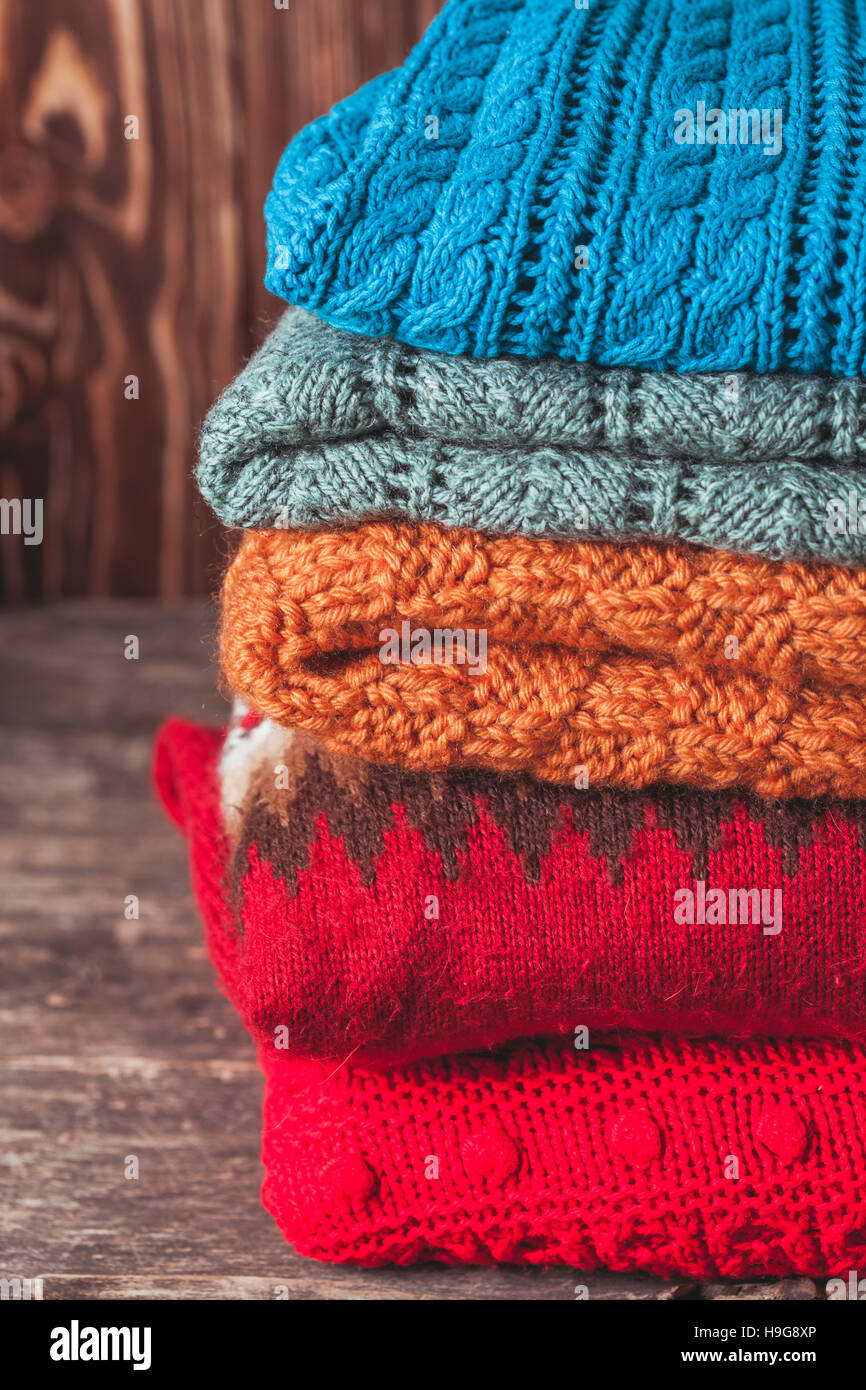 Knitted clothes stack Stock Photo - Alamy