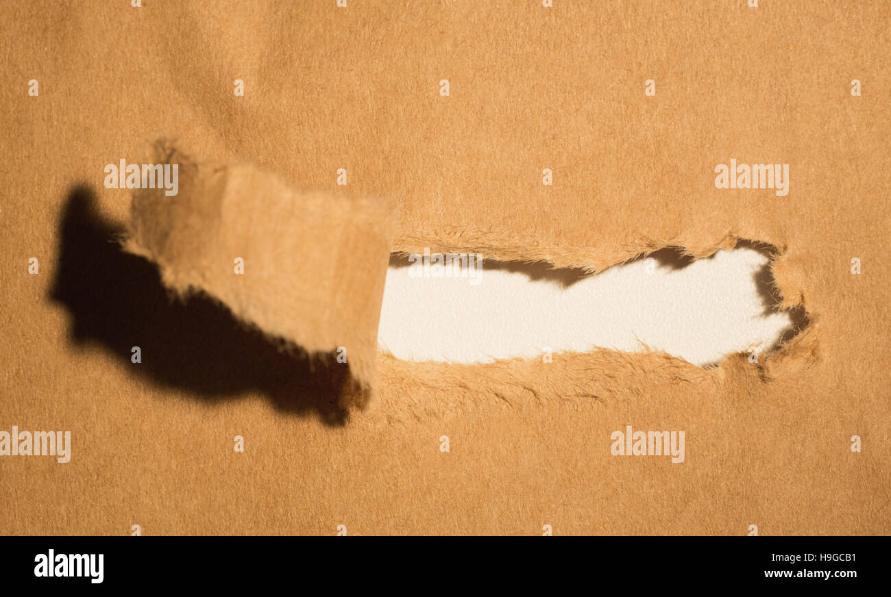 Close-up of damaged brown paper Stock Photo - Alamy