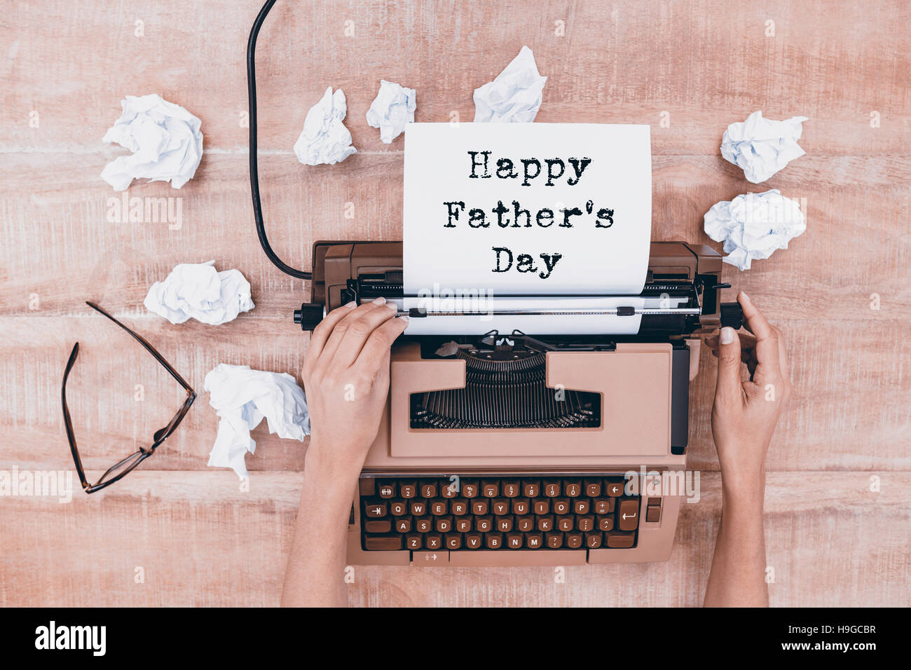Hands using typewriter Stock Photo - Alamy