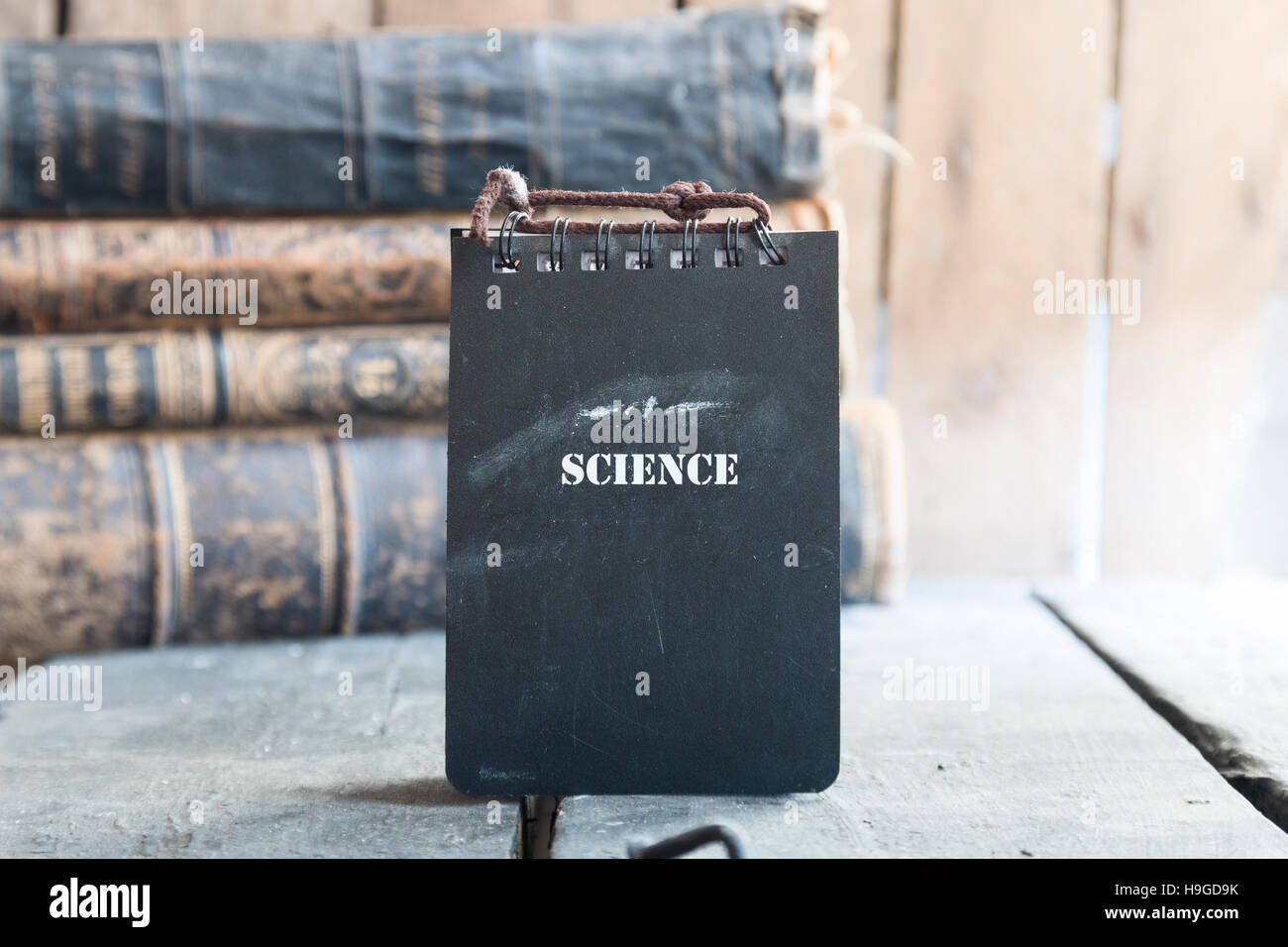 SCIENCE text and old vintage books Stock Photo - Alamy