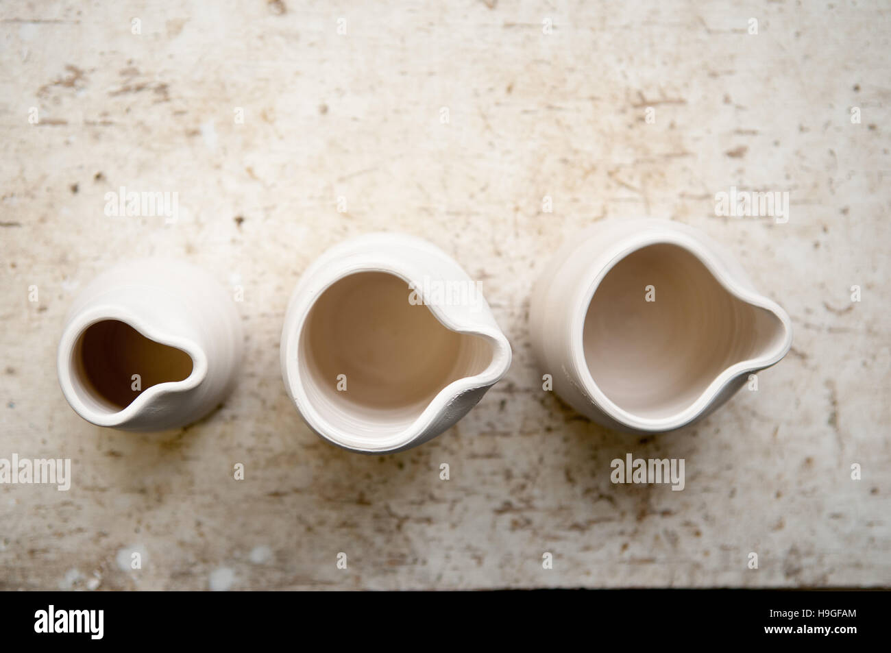 clay pots in a row viewed from above Stock Photo - Alamy