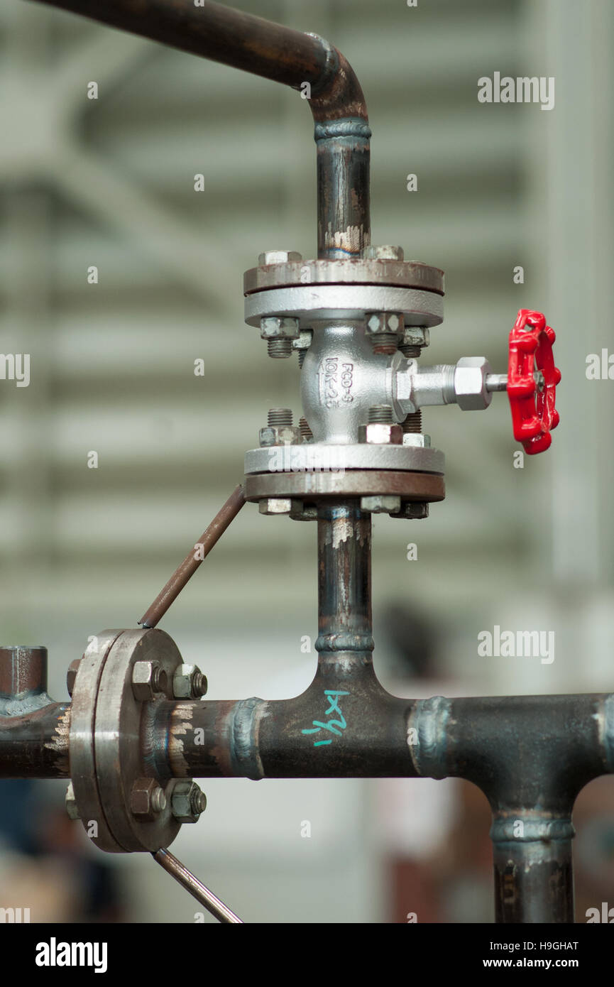 Steel pipes with a valve Stock Photo - Alamy