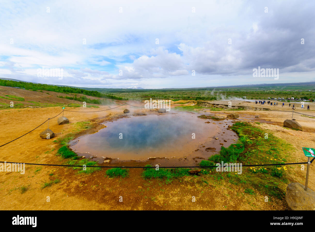 Hot pool of a geyser in Geysir, South Iceland Stock Photo - Alamy