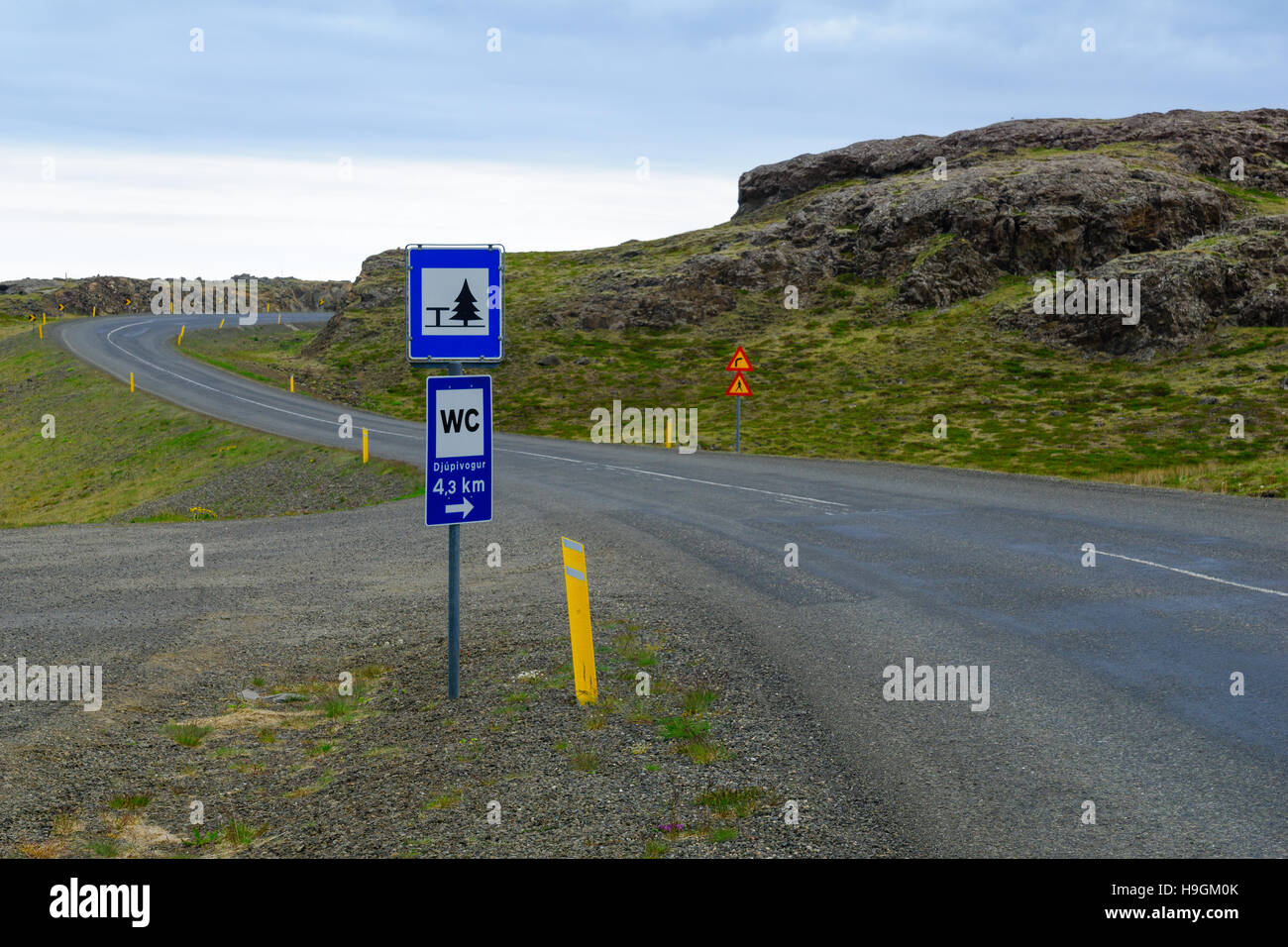 The ring road (no. 1), landscape and road signs in the east fjords ...