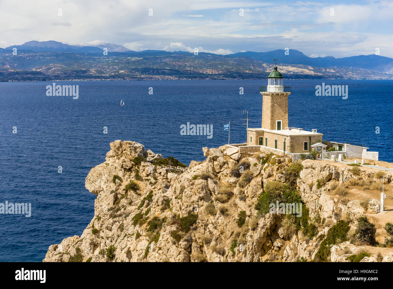 distant view on lighthouse in Melagavi Stock Photo - Alamy