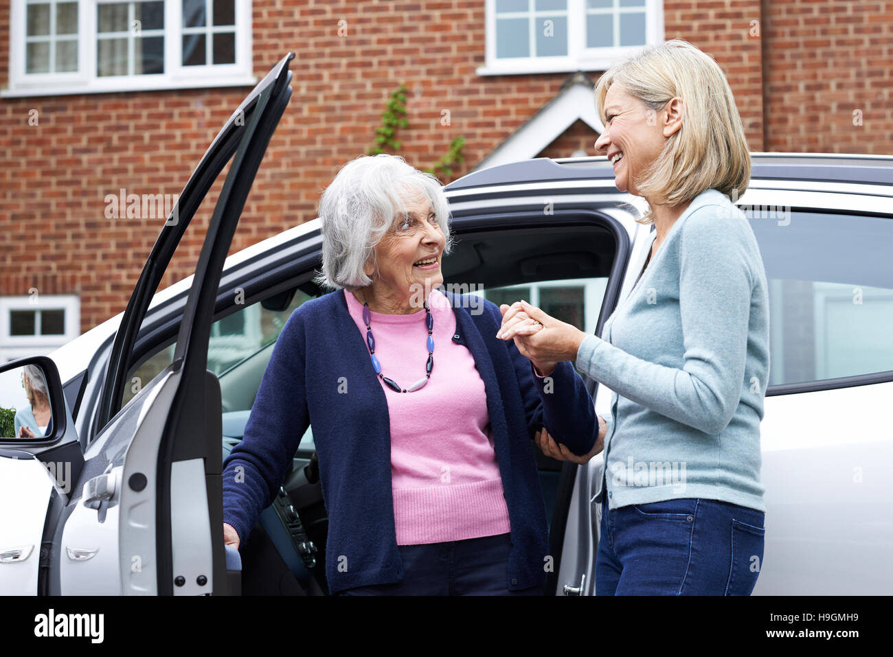 Giving a lift hi-res stock photography and images - Alamy