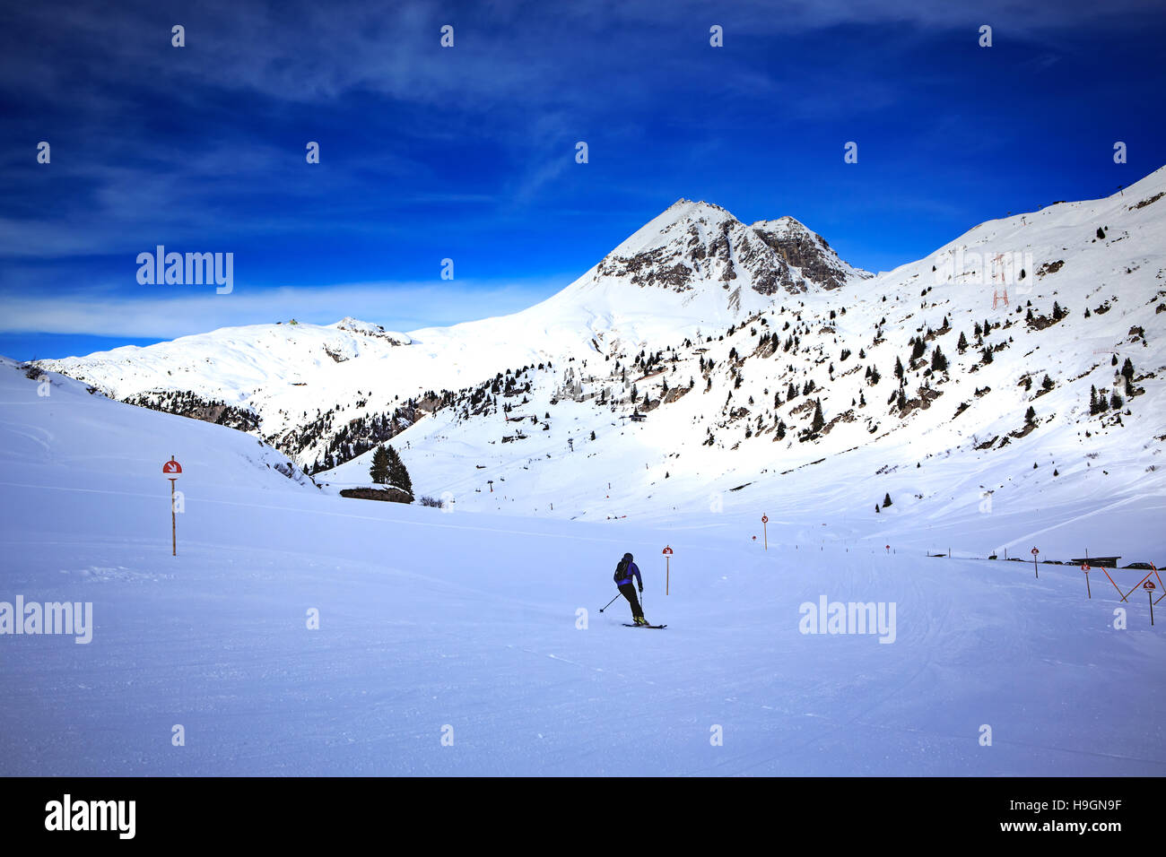 A ski driver on the piste in Alps by Lech, Austria Stock Photo - Alamy