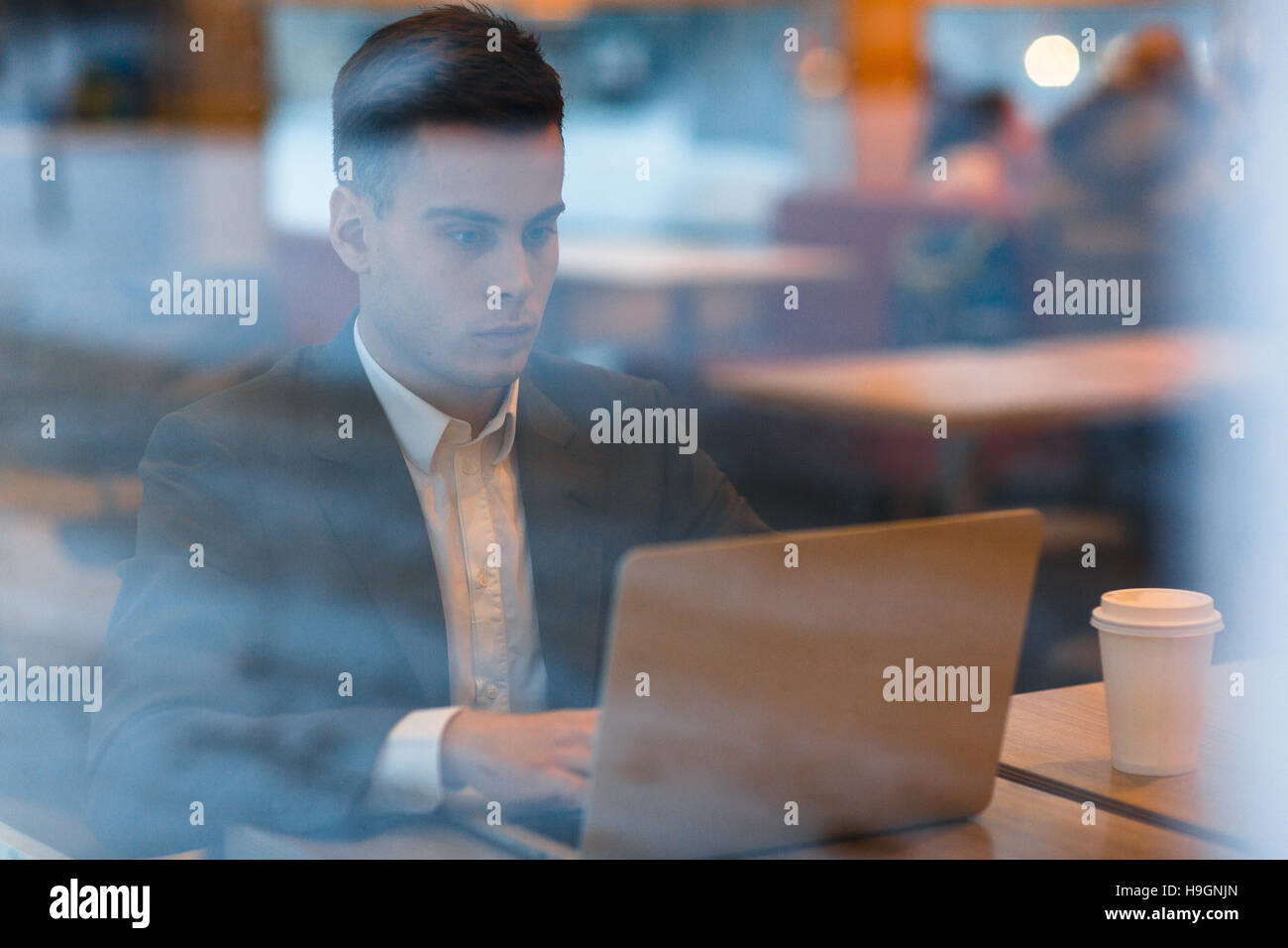 Professional sitting hi-res stock photography and images - Alamy