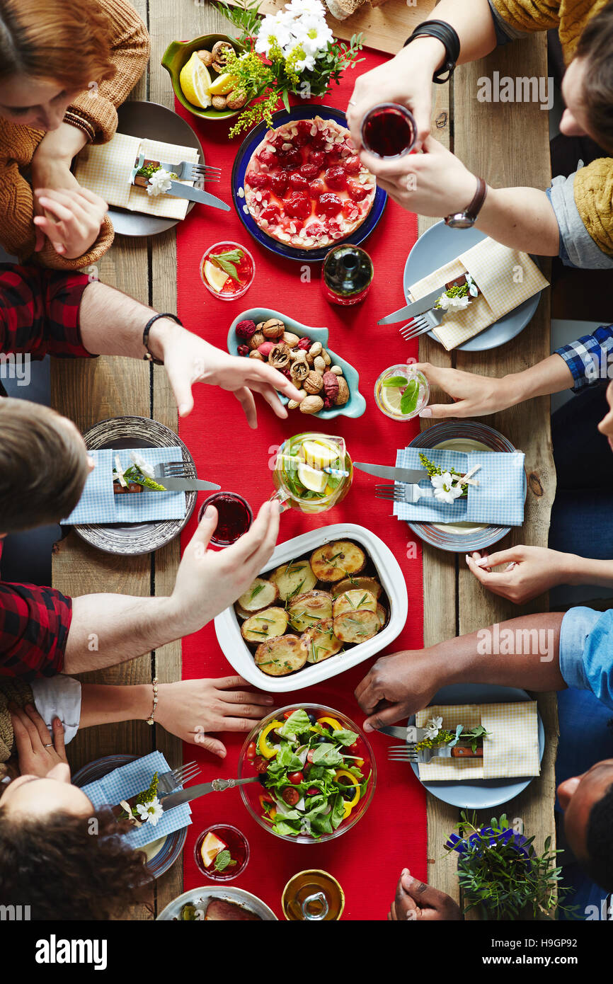 Human hands over festive table during talk Stock Photo - Alamy