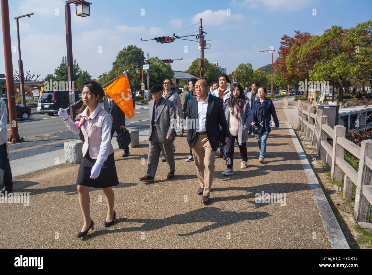 Group tourists japan guide hi-res stock photography and images - Alamy
