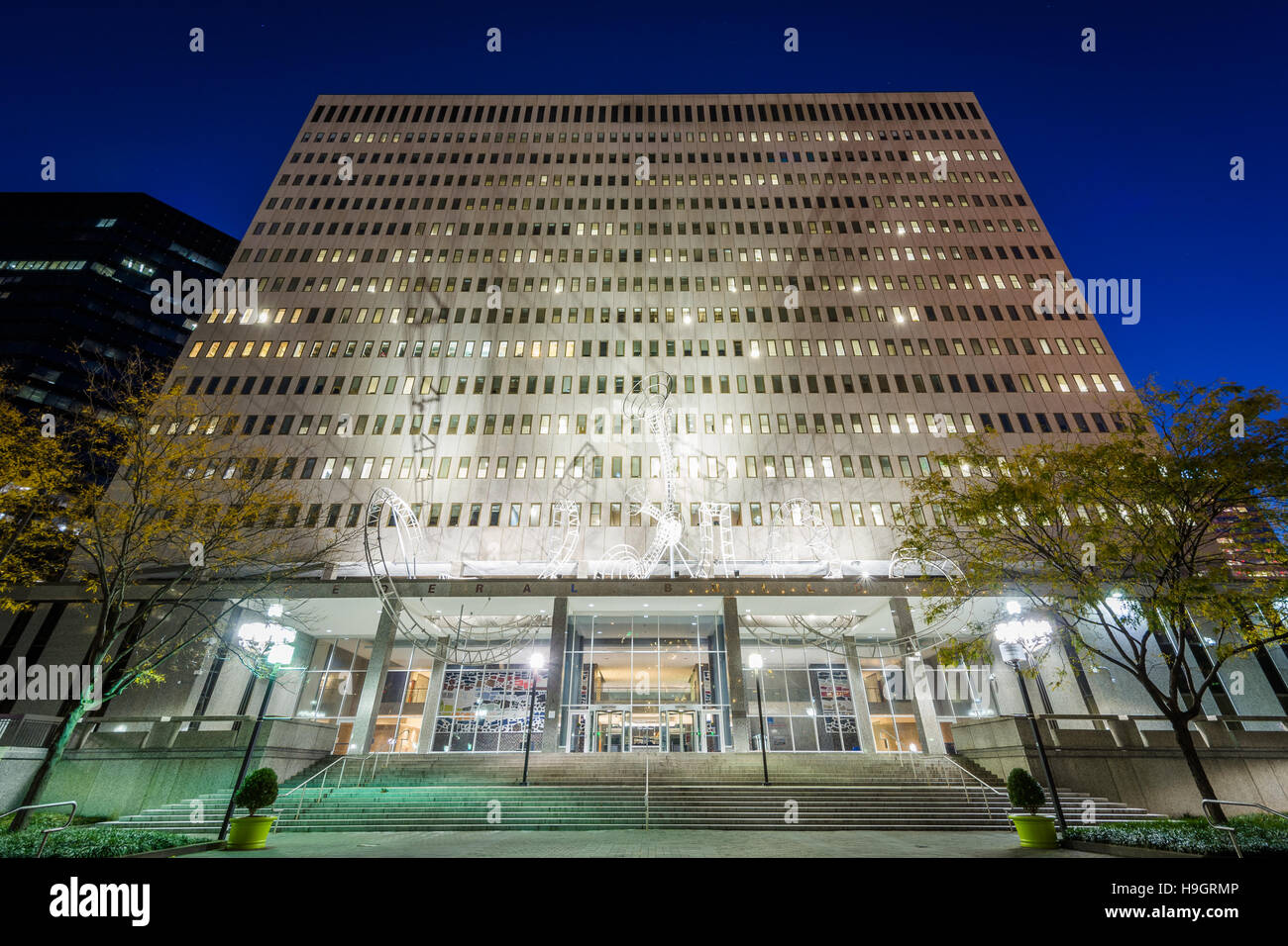 The George H. Fallon Federal Building at night, in Baltimore, Maryland ...