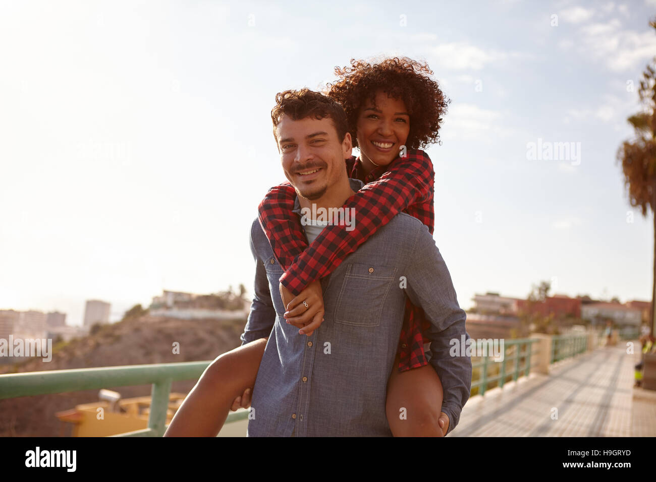 Brown curly hair of a woman from the back hi-res stock photography and ...