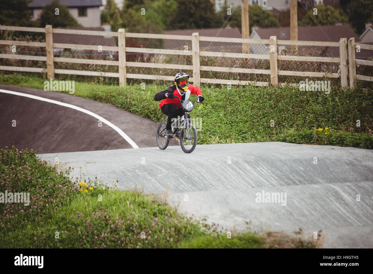 Cyclist riding BMX bike Stock Photo - Alamy