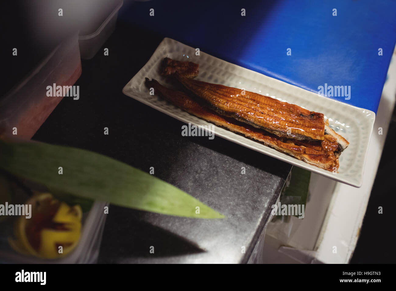 Fried fish on serving tray Stock Photo - Alamy