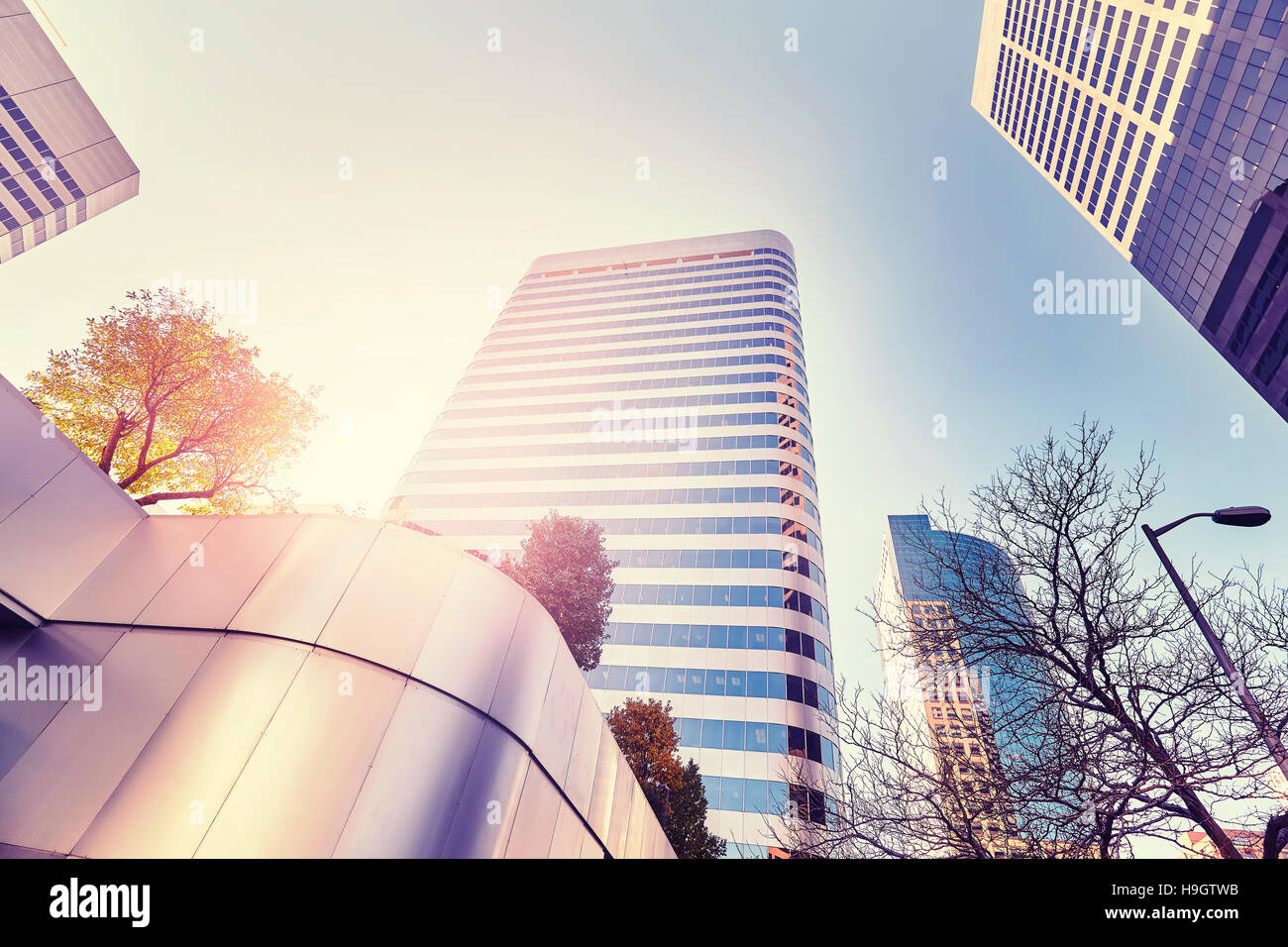 Vintage purple toned photo of Denver downtown skyscrapers after sunrise ...