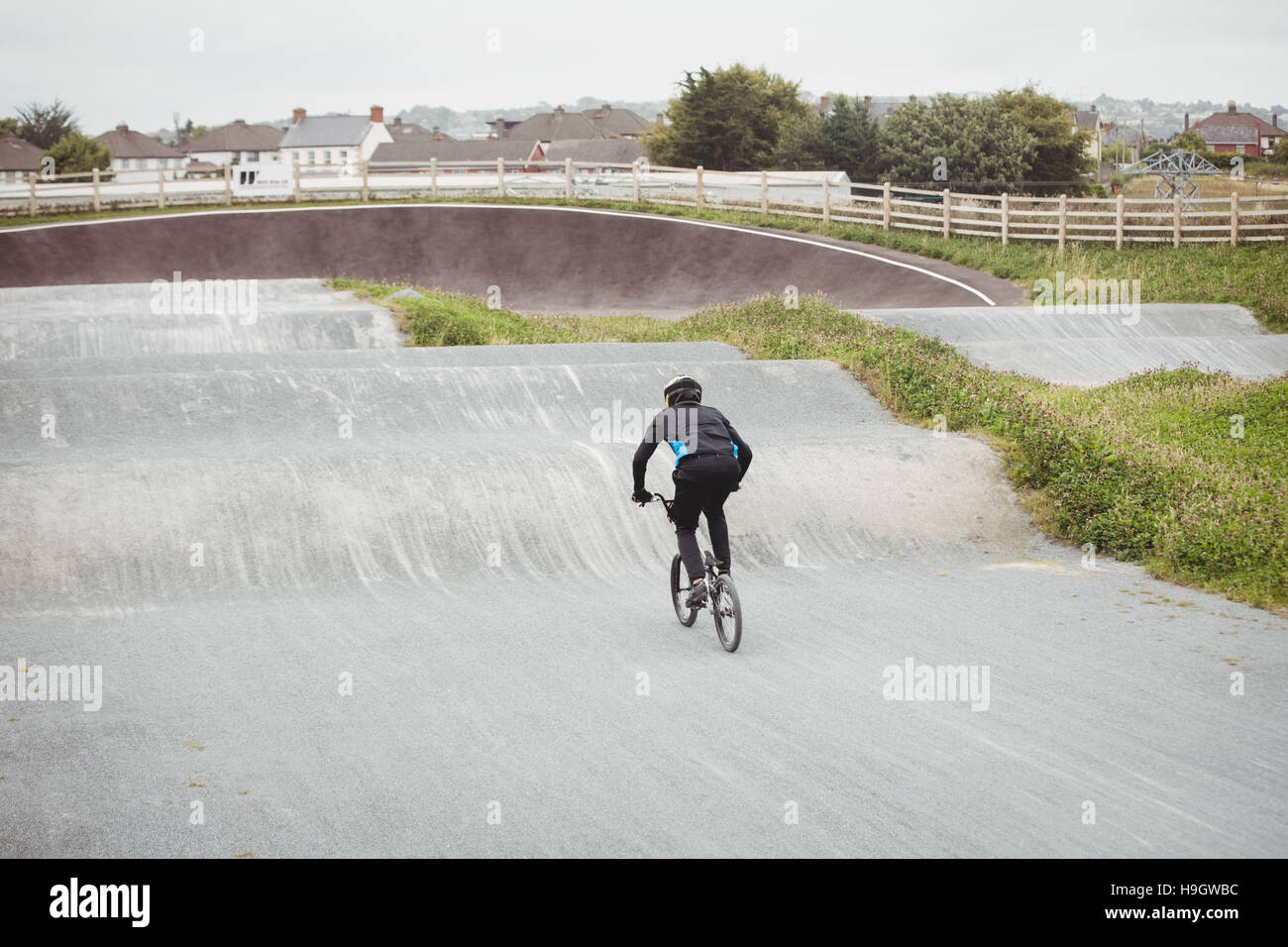 Cyclist riding BMX bike Stock Photo - Alamy