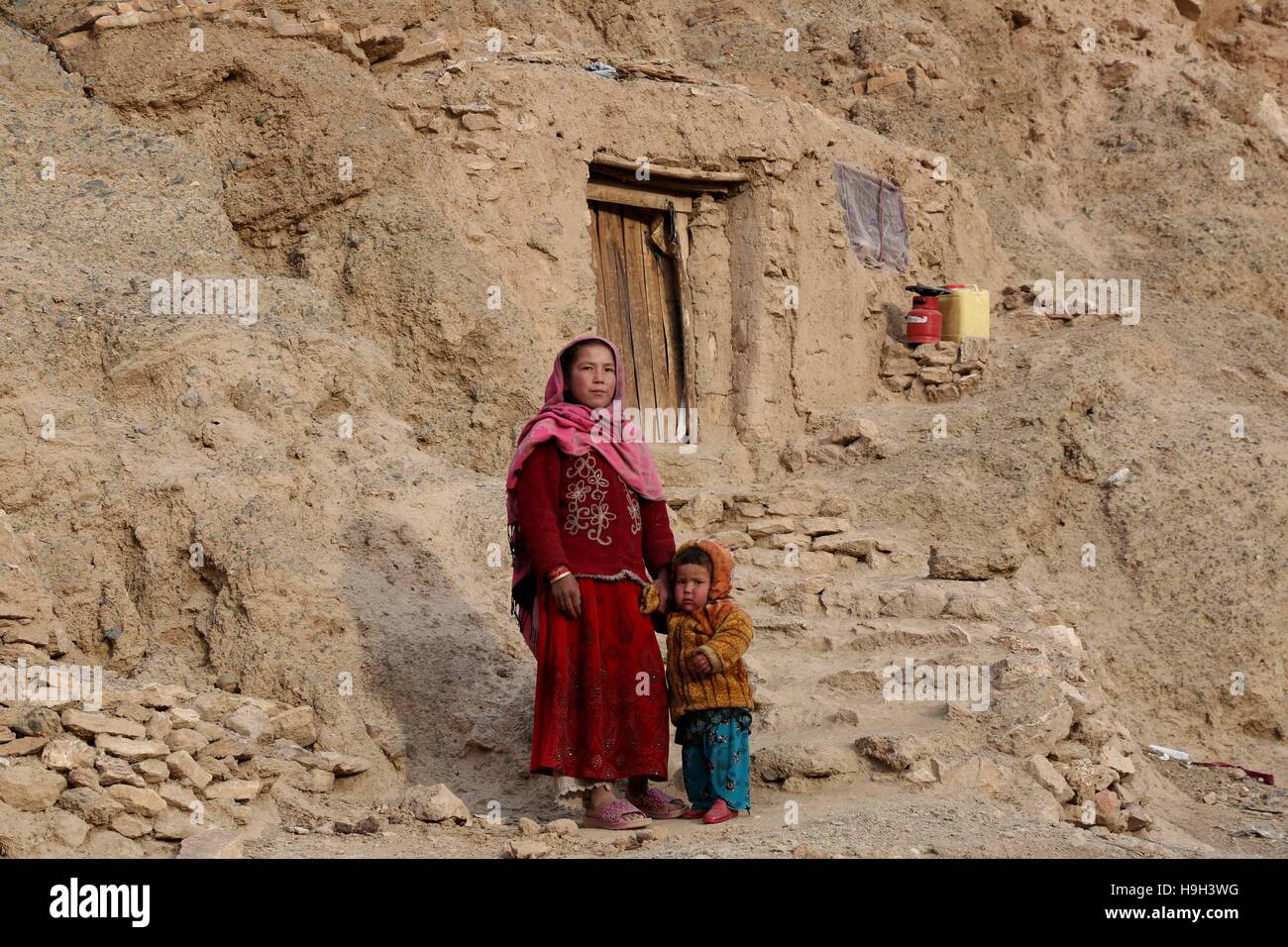 Bamyan, Afghanistan. 22nd Nov, 2016. Afghans stand in front of their ...