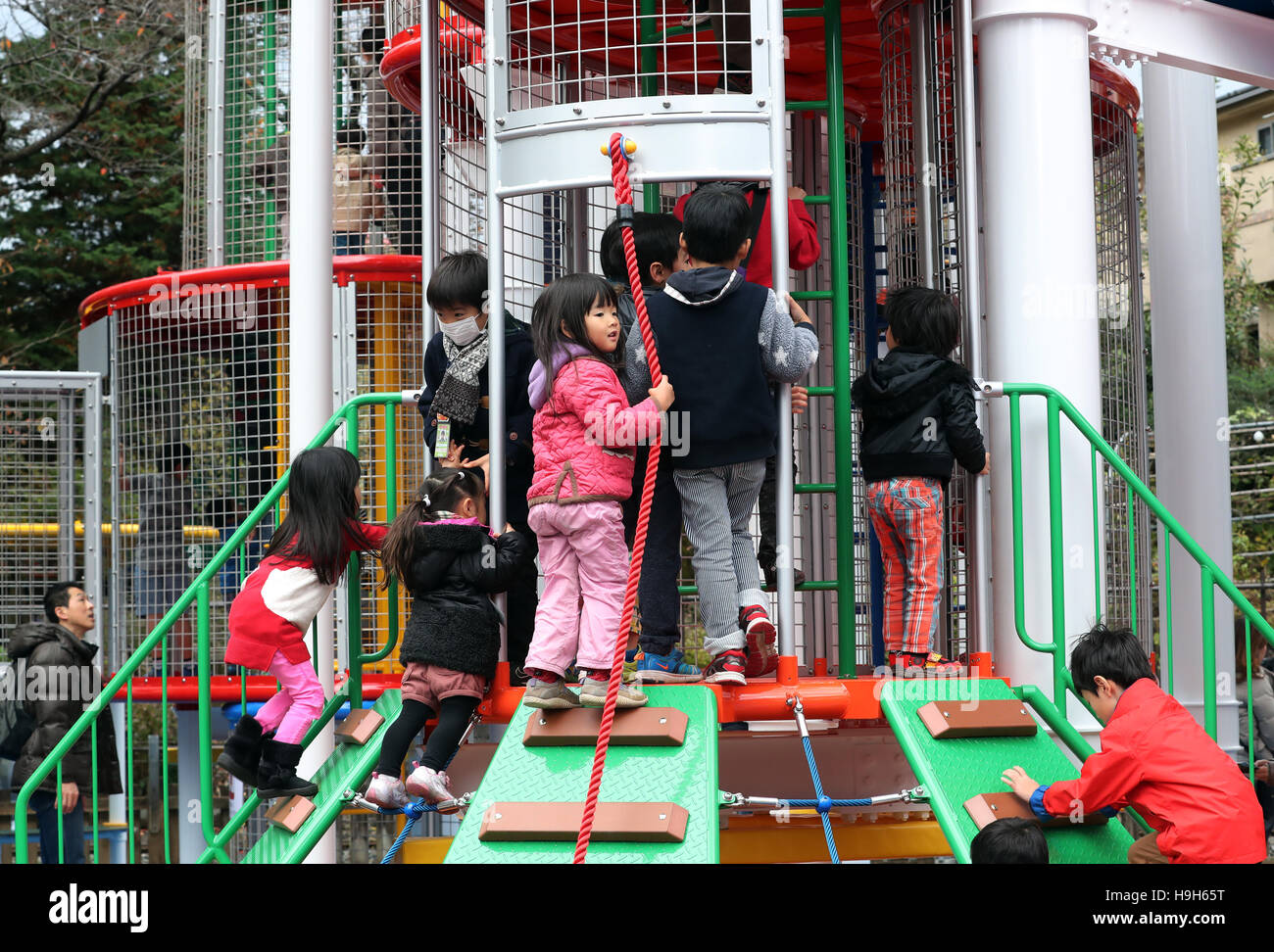 Tokyo, Japan. 23rd Nov, 2016. Children play on the equipments at the ...