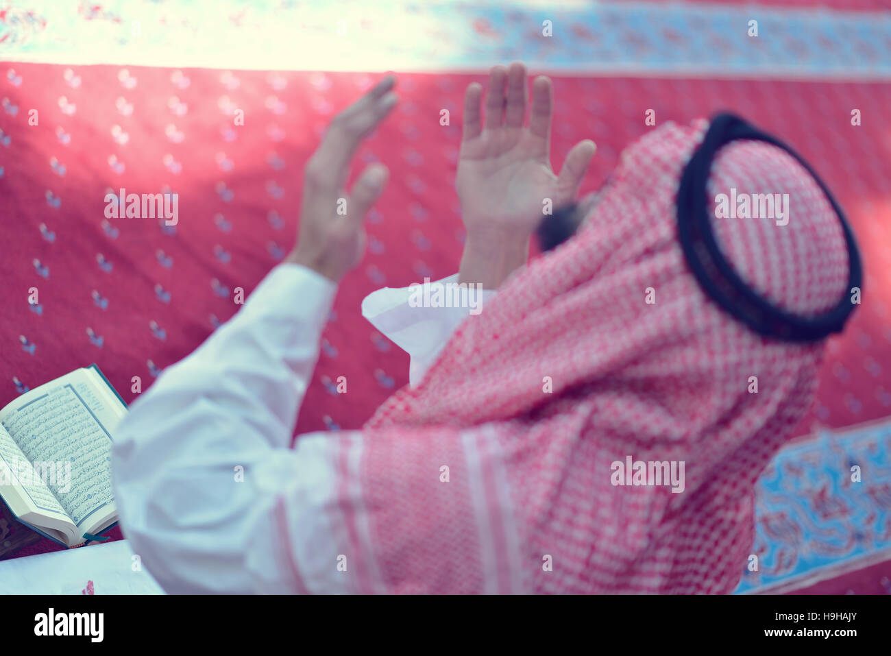 Muslim Arabic man praying Stock Photo - Alamy