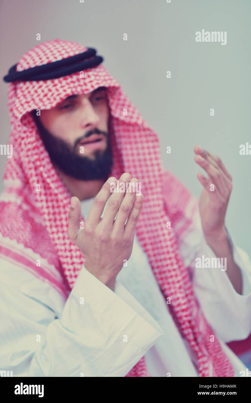 Muslim Arabic man praying Stock Photo - Alamy