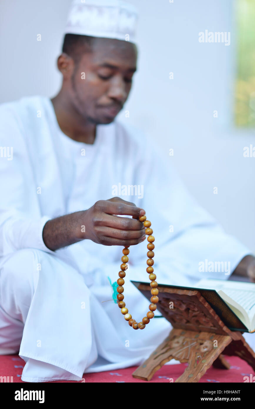 African Muslim Man Praying To God Stock Photo - Alamy