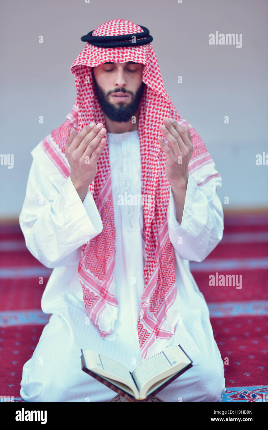Muslim Arabic man praying Stock Photo - Alamy