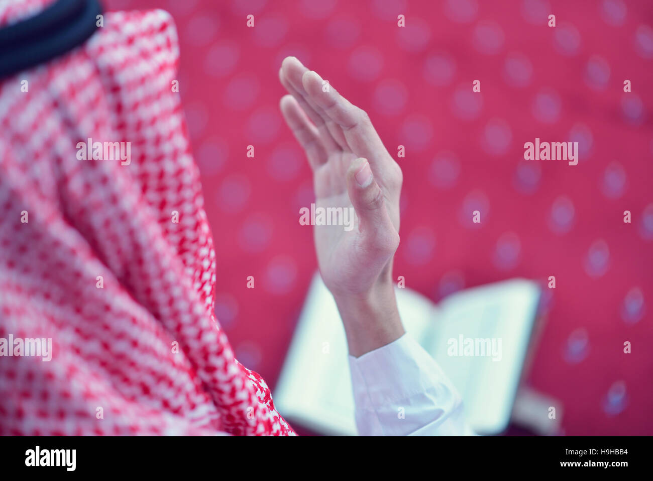 Muslim Arabic man praying Stock Photo - Alamy