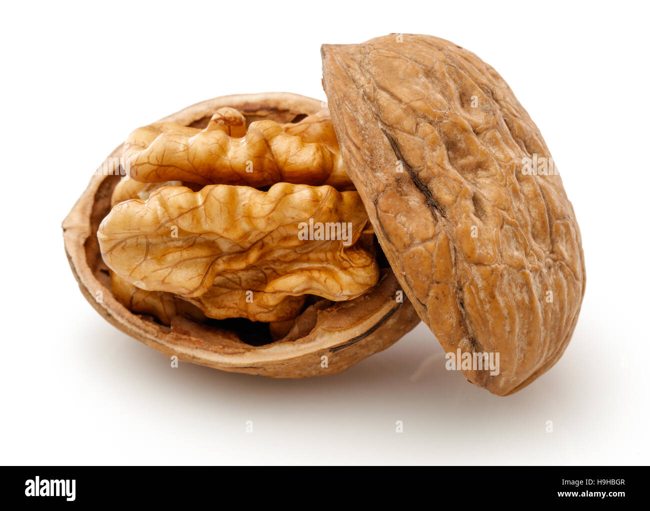 Half walnut kernel. Isolated on a white background Stock Photo - Alamy